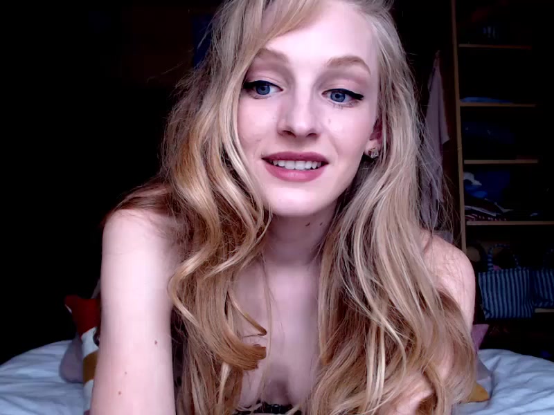 Blue Eyed Beauty In Bed
